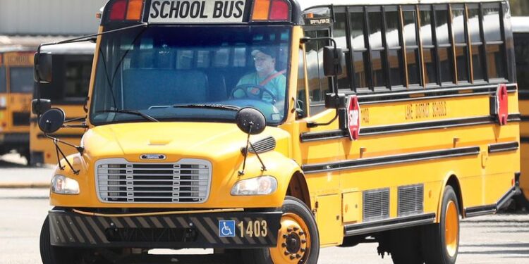 Driver shortage: Crowded school buses run late as districts offer ...